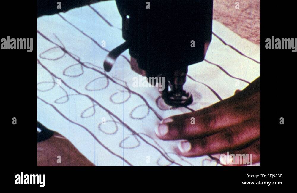 1960s: Vocational high school, girl operates sewing machine, sews by ...