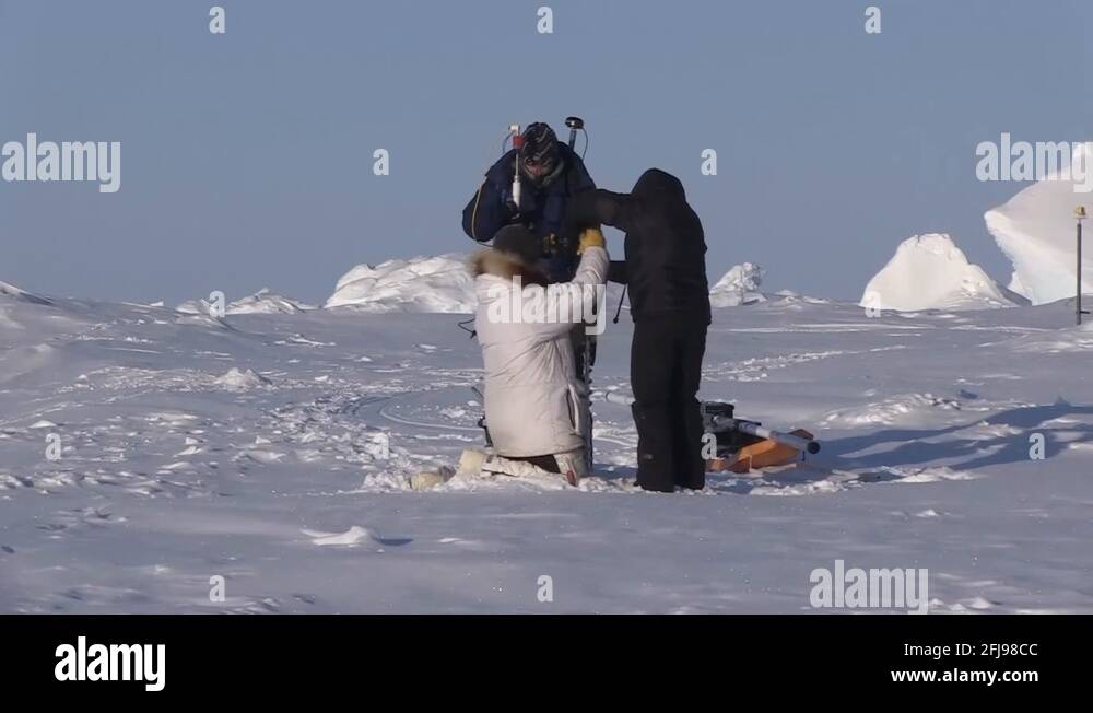 Crew members work and check operations in support of Ice Exercise ...