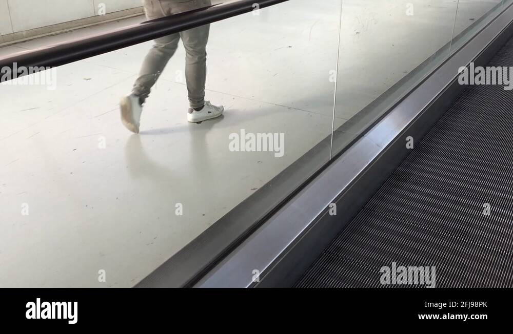 Legs walking at train station Stock Video Footage - Alamy