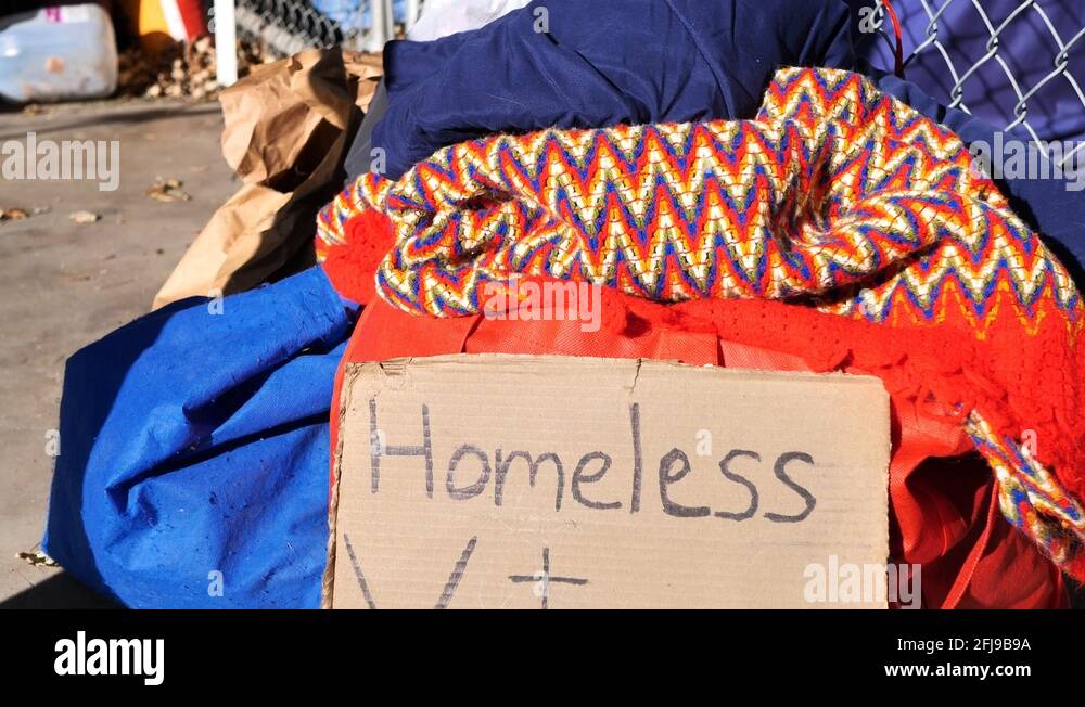 Beggar hand signs Stock Videos & Footage - HD and 4K Video Clips - Alamy