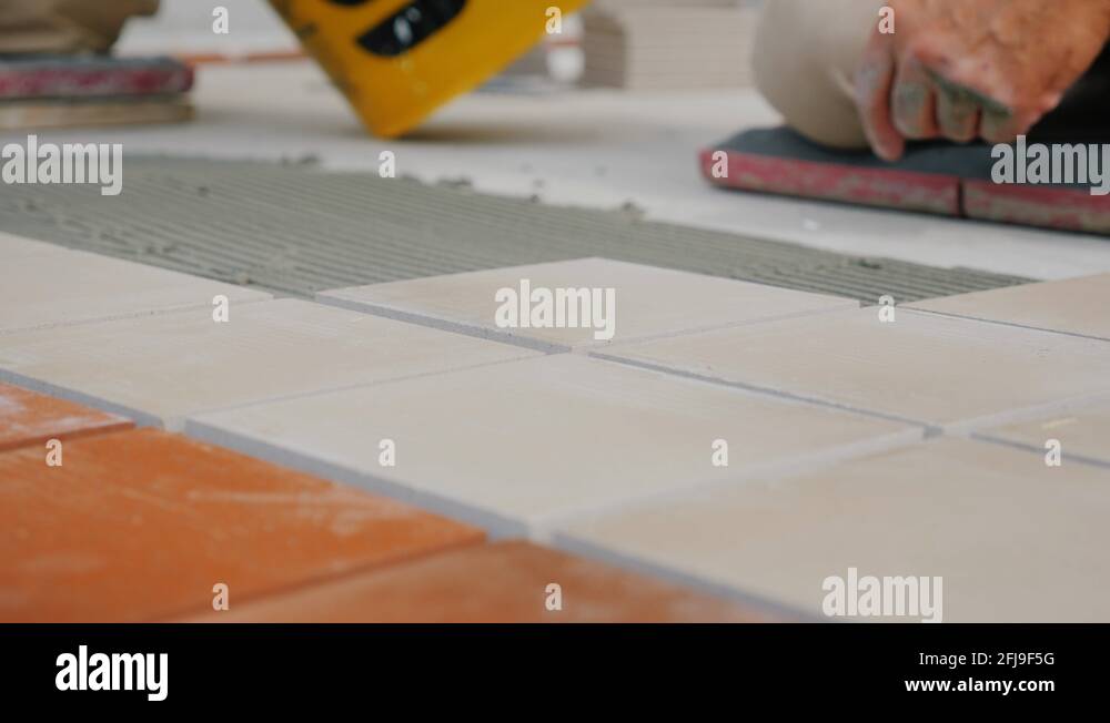 Construction workers laying tile Stock Videos & Footage - HD and 4K ...