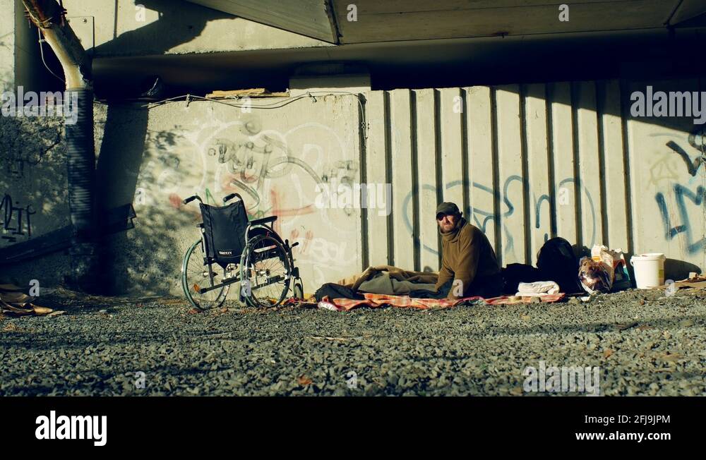 Authentic emotion of homeless people in place under a bridge ...