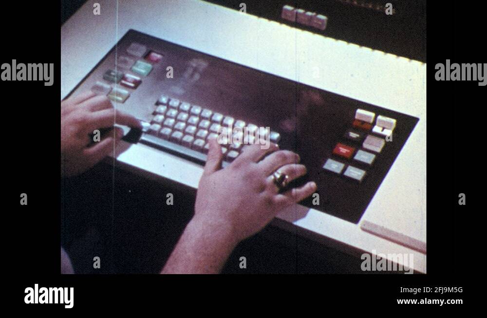 1960s: Student types on keyboard, needle moves over paper, printer ...