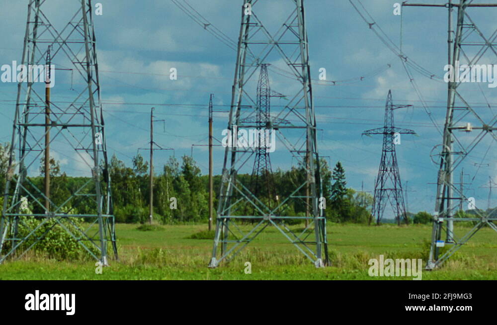 base of power line poles, medium shot. Panorama from left to right ...