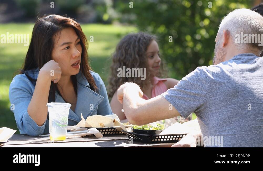 Family talking table Stock Videos & Footage - HD and 4K Video Clips - Alamy