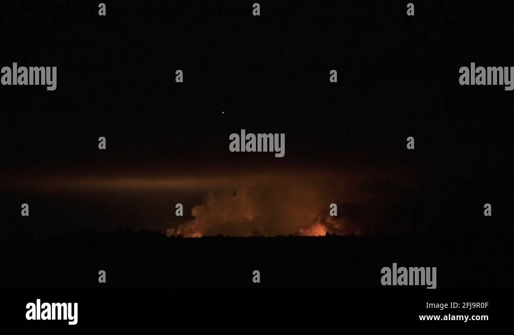 Blinking in the smoke on the horizon and a very bright light falling ...