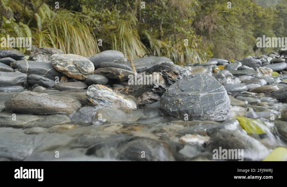 Water running over pebbles or rocks Stock Videos & Footage - HD and 4K ...