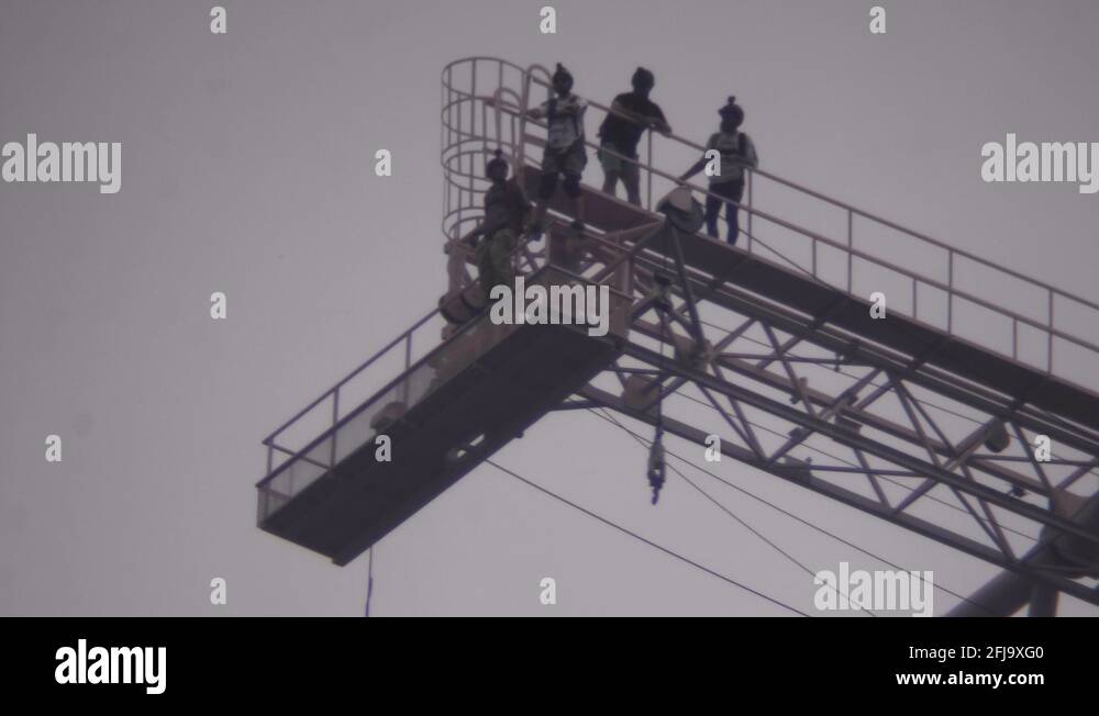 Base jumpers jumping from Menara tower in Kuala Lumpur Stock Video ...