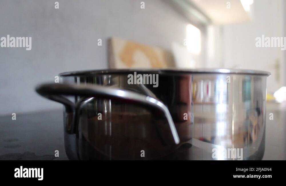 Cooking rice pot Stock Videos & Footage - HD and 4K Video Clips - Alamy