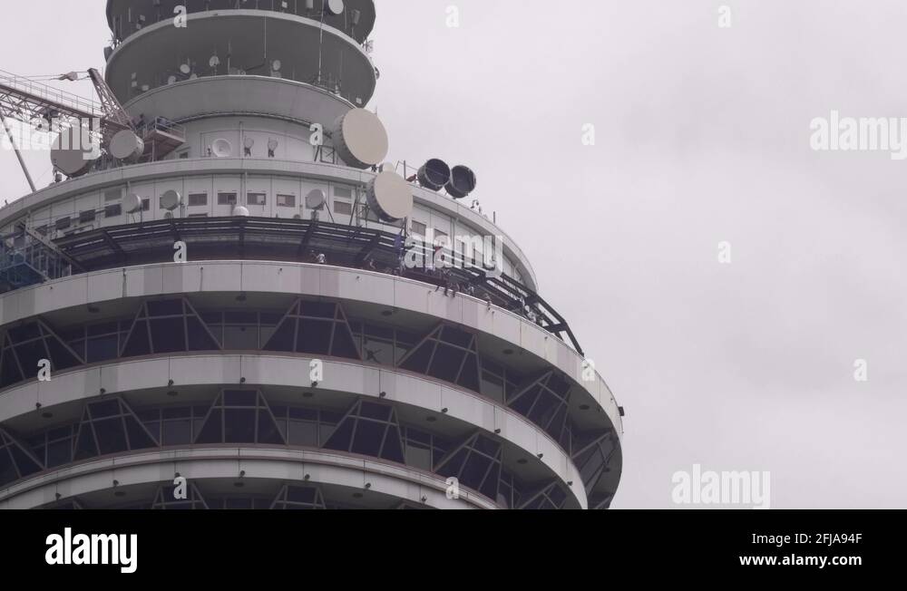 Base jumpers jumping from Menara tower in Kuala Lumpur Stock Video ...