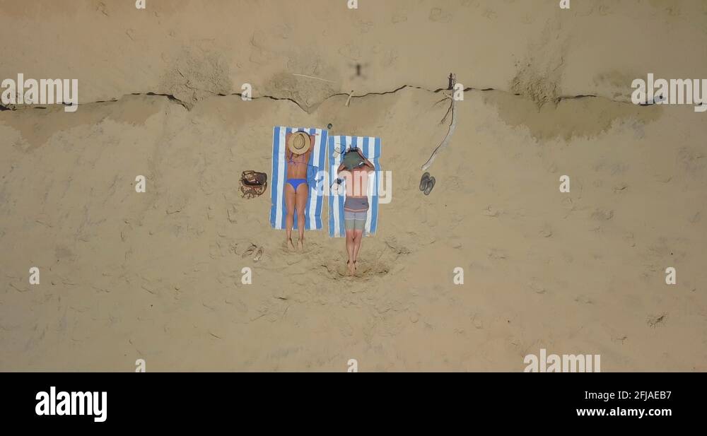 Sunbathing on beach aerial Stock Videos & Footage - HD and 4K Video ...