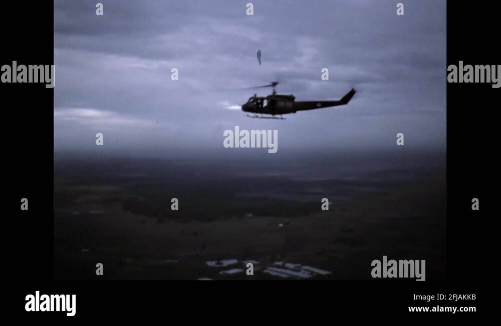 US Army Helicopters In Flight Over Rural Territory In Vietnam Stock ...