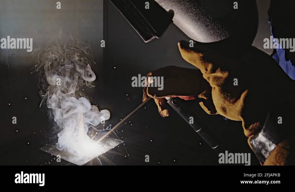 Welder wearing safety equipment welding Stock Videos & Footage - HD and ...