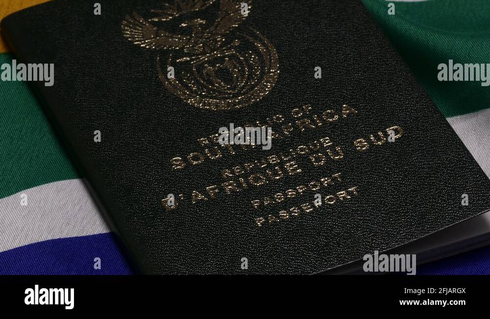 Dolly in RSA passport on SA flag Stock Video Footage - Alamy
