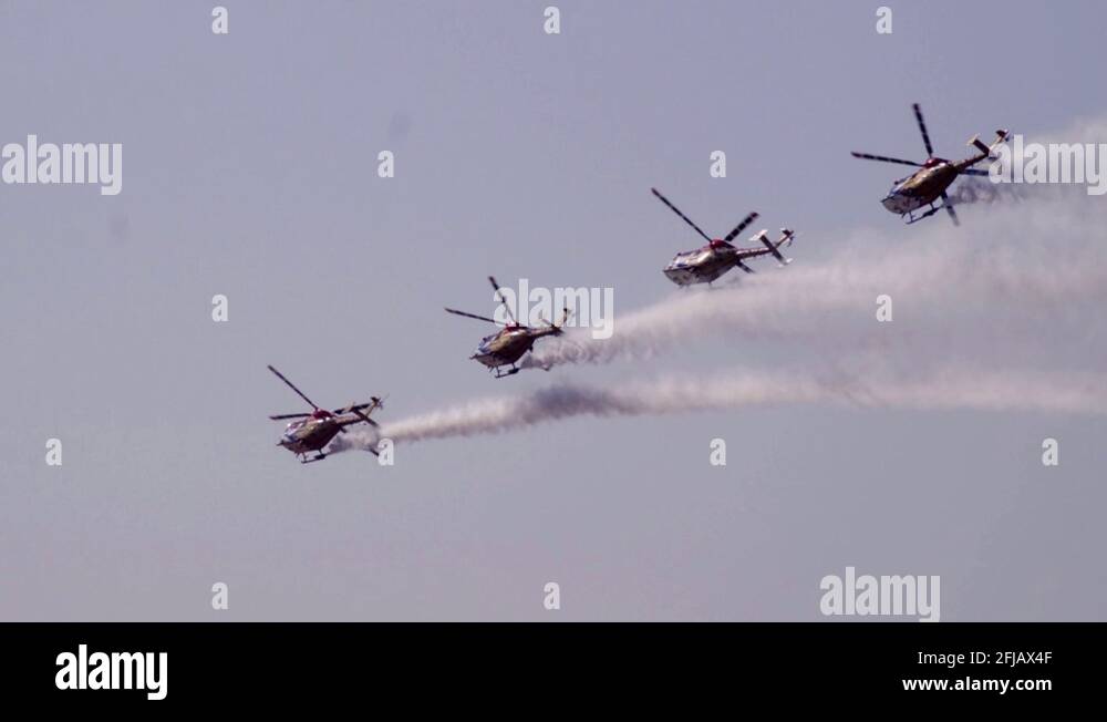 Helicopters flying with smoke trails cinemagraph plotagraph Stock Video ...