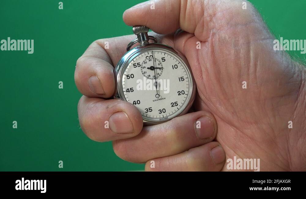 Green screen Stopwatch in hand Stock Video Footage - Alamy