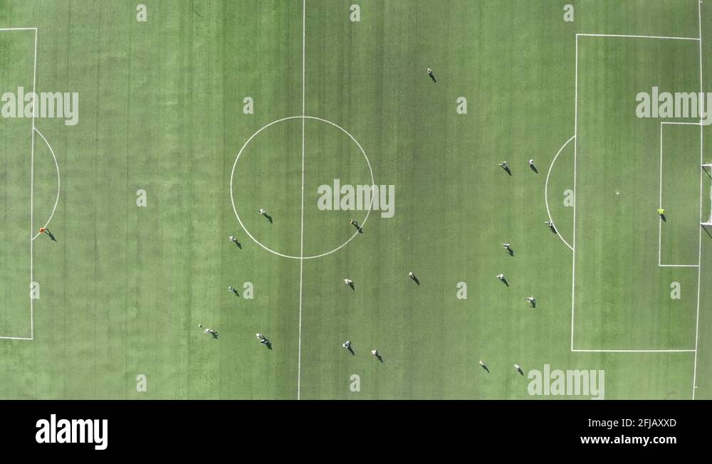 People play football stadium aerial video Stock Video Footage - Alamy
