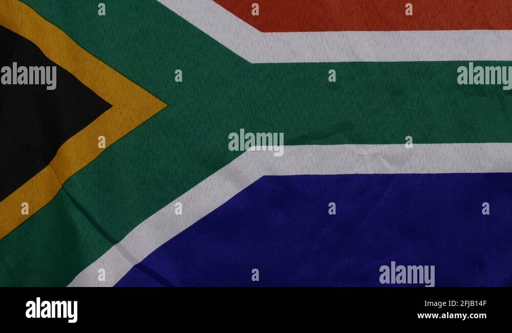Flatlay Handing over South African passport on SA flag Stock Video ...