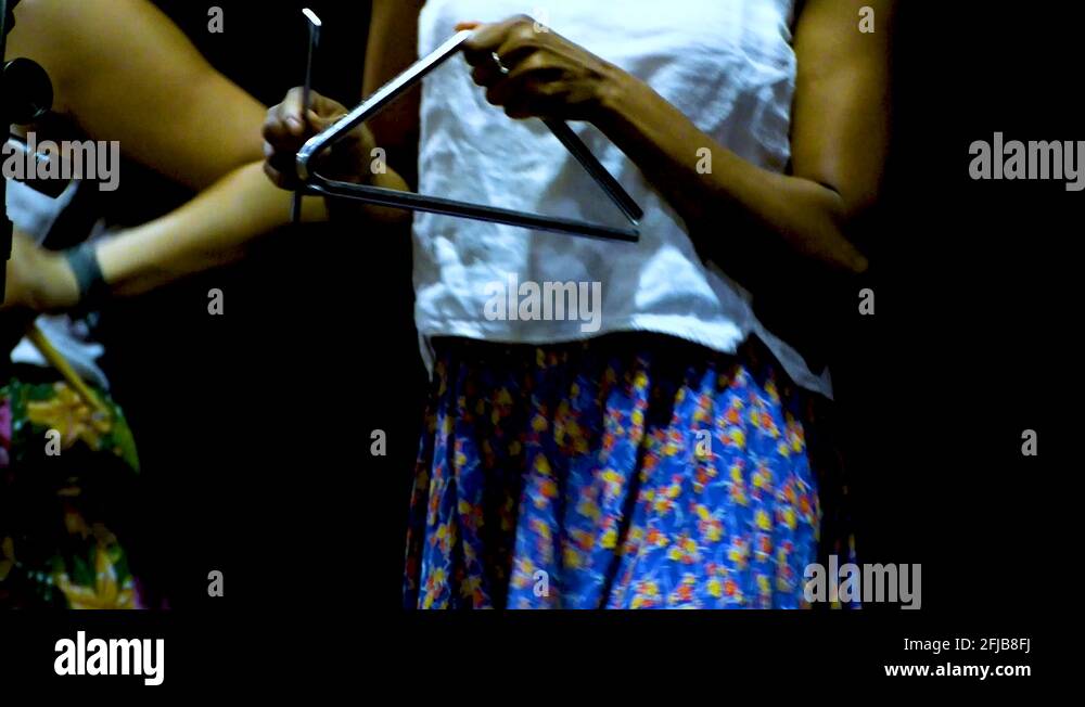 Playing the triangle Stock Videos & Footage - HD and 4K Video Clips - Alamy