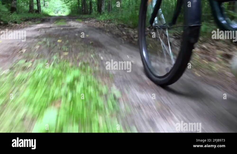 Low angle of track, wheels and legs cycling through Europes largest and ...