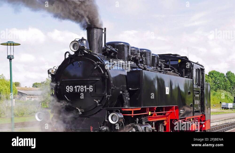 Old vintage steam engine billowing smoke cinemagraph plotagraph Stock ...