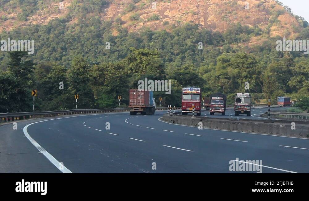 Indian highway Big Turning point background with heavy vehicles Stock ...