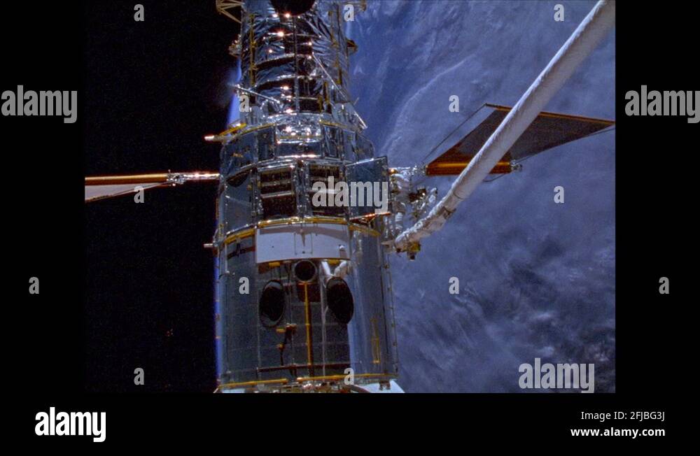 NASA astronauts works on Hubble Space Telescope - 1990 Stock Video ...
