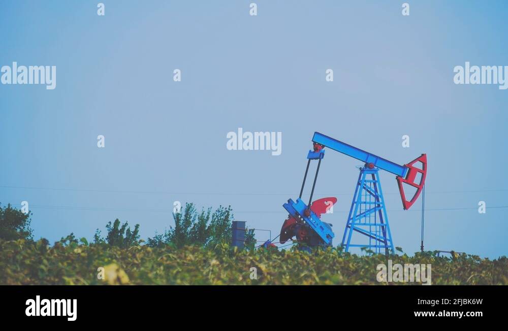 The oil pump, industrial equipment. Operating oil and gas well in ...