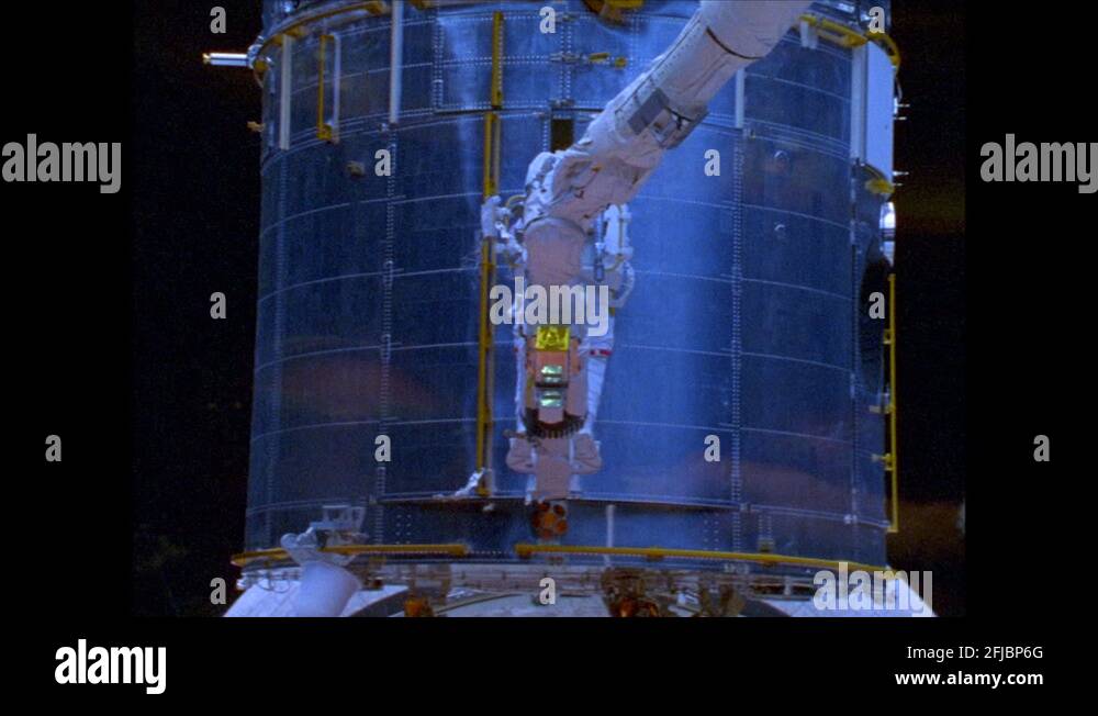 NASA astronauts works on Hubble Space Telescope - 1990 Stock Video ...