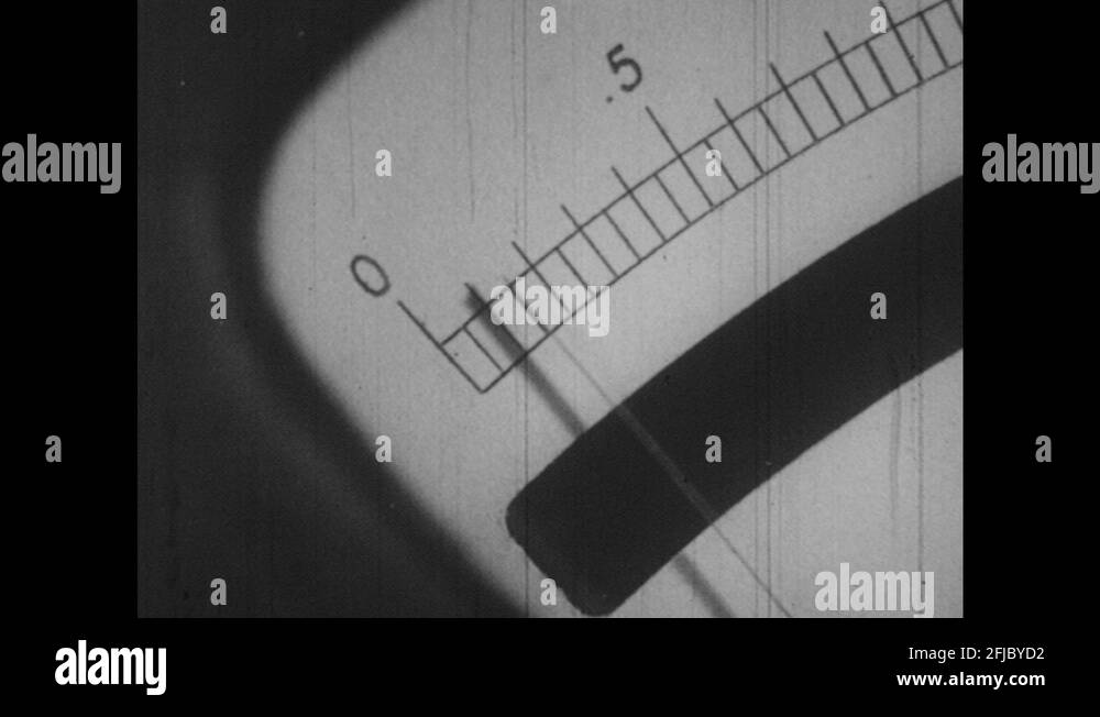 1940s: Ammeter points to 2,0 Amp. Hands connect the small cell with ...