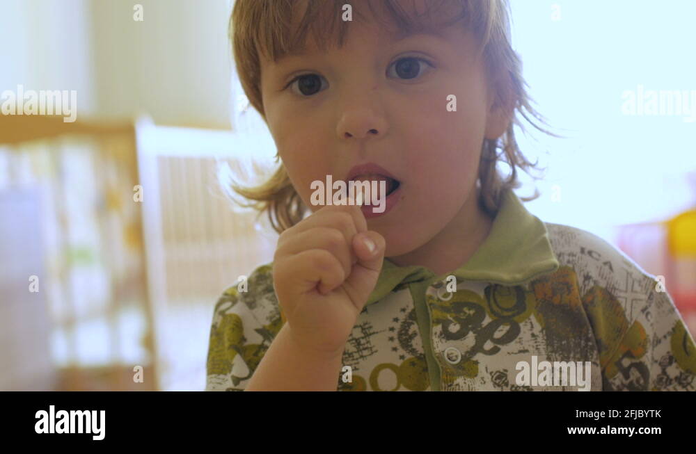 Child boy eating candy stick Stock Videos & Footage - HD and 4K Video ...