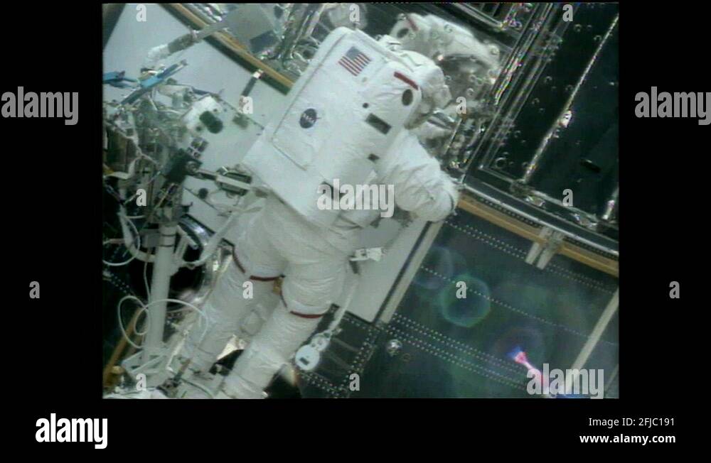 NASA astronauts works on Hubble Space Telescope - 1990 Stock Video ...
