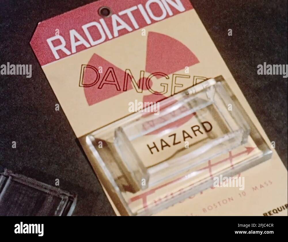 Doctor testing sample of stem cells on microscope in lab - 1957 Stock ...