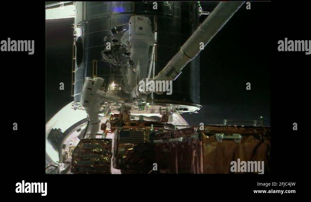 NASA astronauts works on Hubble Space Telescope - 1990 Stock Video ...