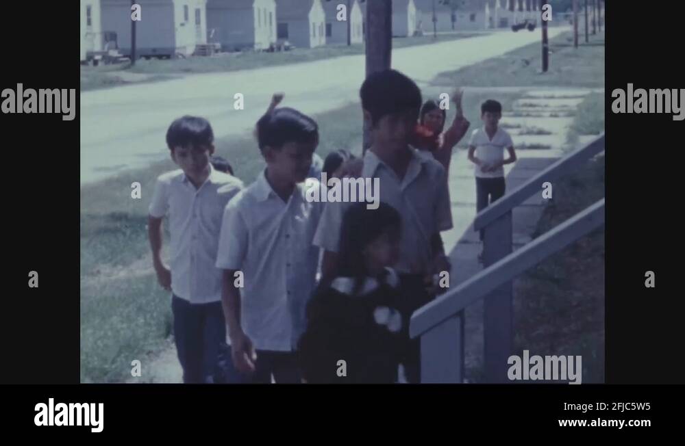 Refugee children enter mess hall at Fort Chaffee - 1975 Stock Video ...