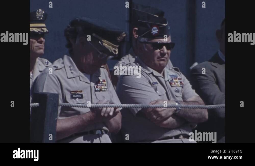 Mr. Friedman speaks and introduces guests sitting on speaker platform ...