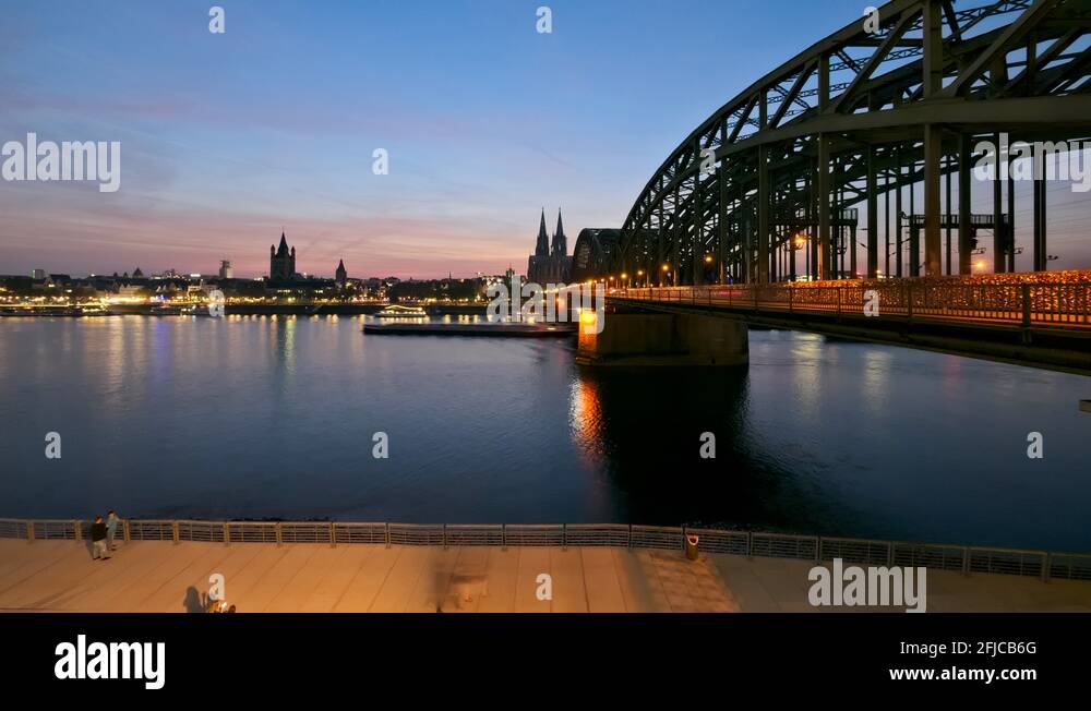 Cologne cathedral with hohenzollern bridge at dusk Stock Videos ...