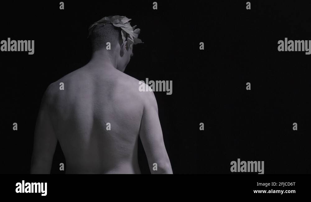 Scary living statue of an ancient greek with bloody tears on his face ...