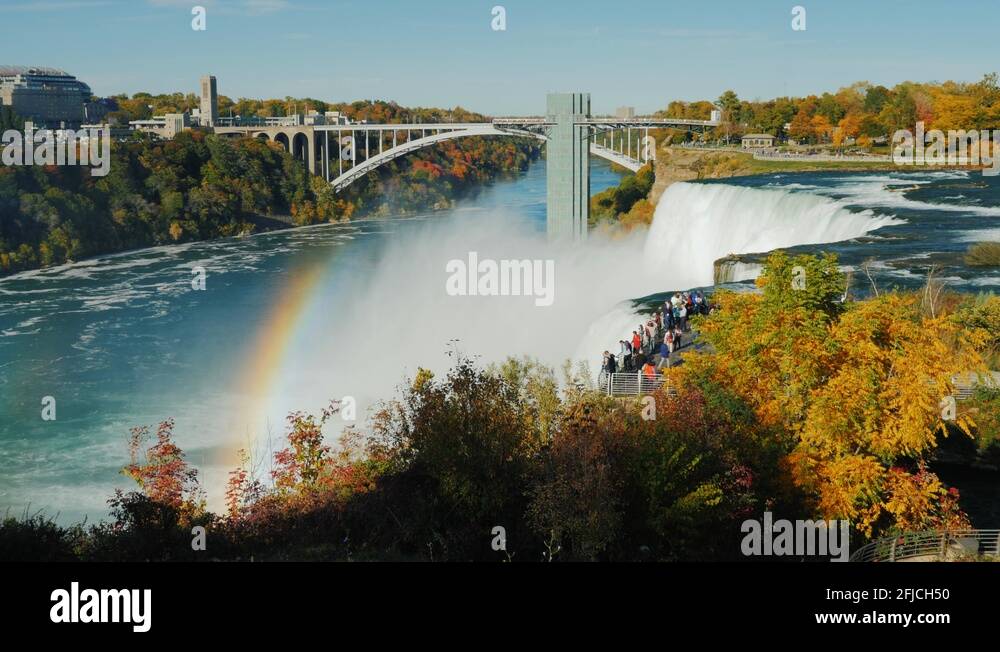 The observation deck near the famous Niagara Falls. Tourists admire the ...