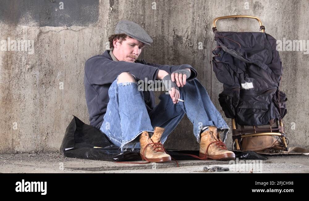 Man squatting smoking cigarette smoking Stock Videos & Footage - HD and ...