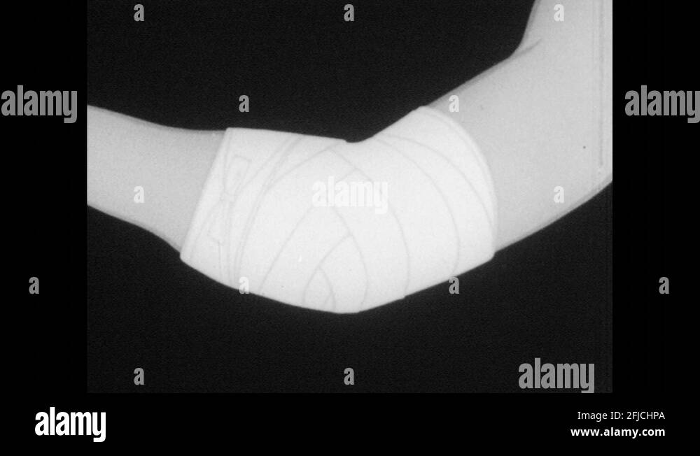 Bandage the elbow Stock Videos & Footage - HD and 4K Video Clips - Alamy