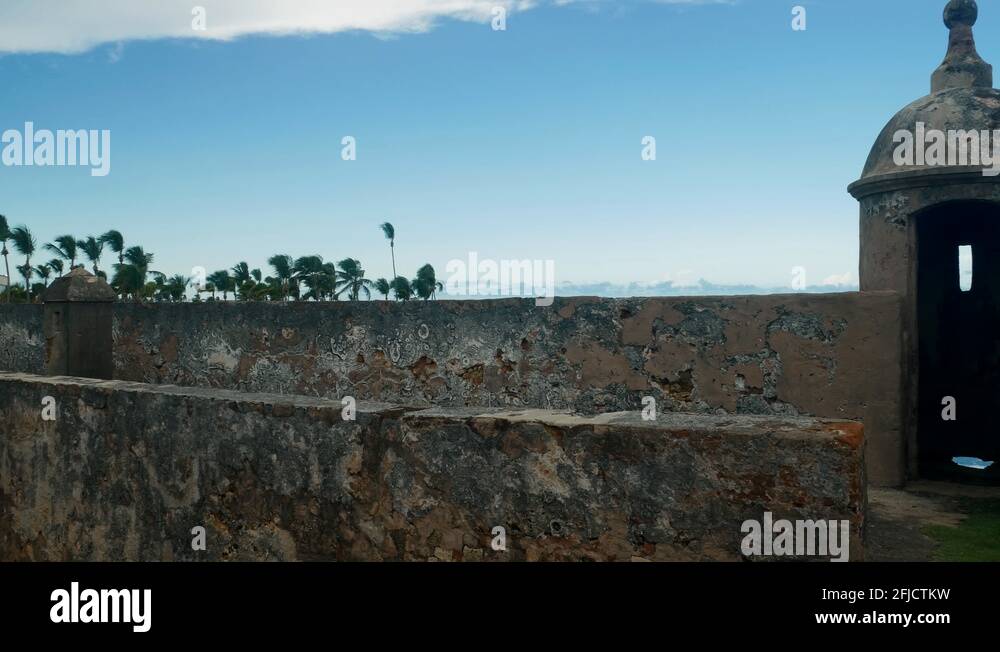 Pan to Spanish Empire Era sentry box at Fort San Geronimo, Puerto Rico ...