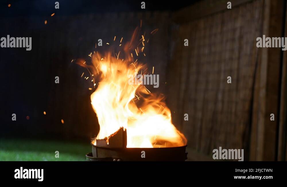 Adding wood fire Stock Videos & Footage - HD and 4K Video Clips - Alamy
