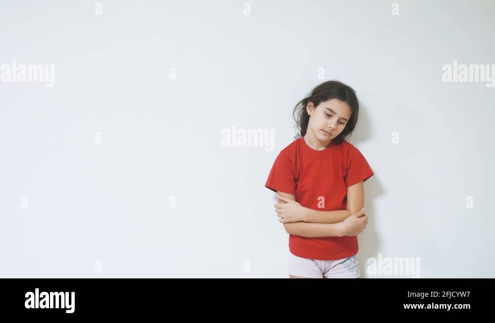 sad and depressed little girl standing by the wall. girl children sad ...