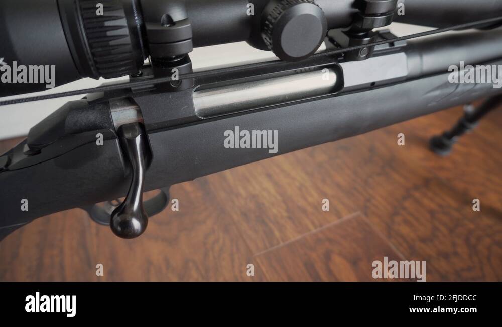 A Hand Loading Bolt Action Rifle Stock Video Footage - Alamy