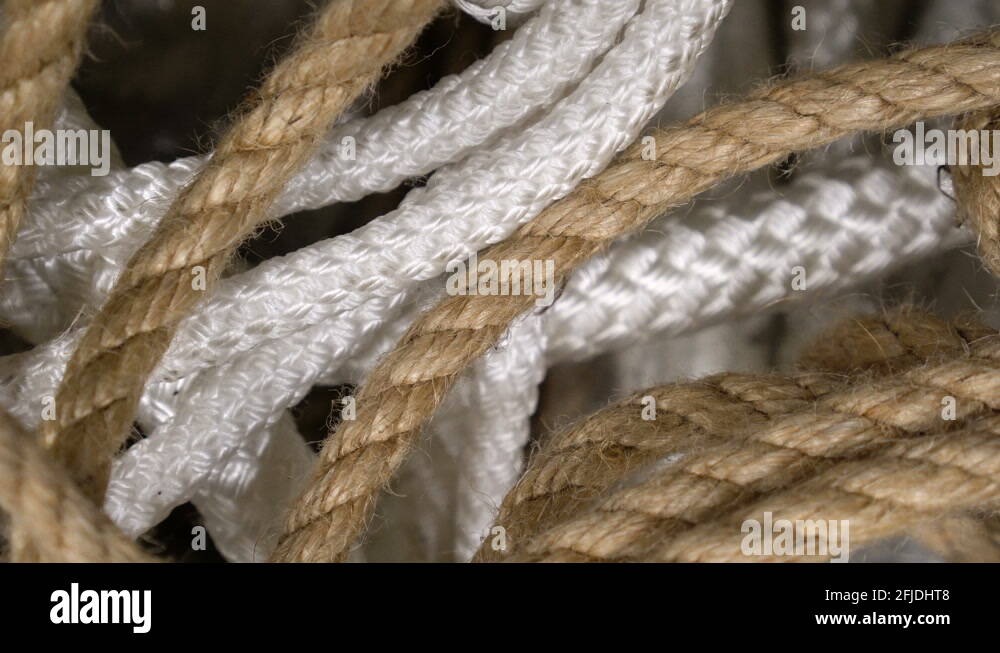 Rotation set rope of brown, white in form spiral closeup. Rope ...