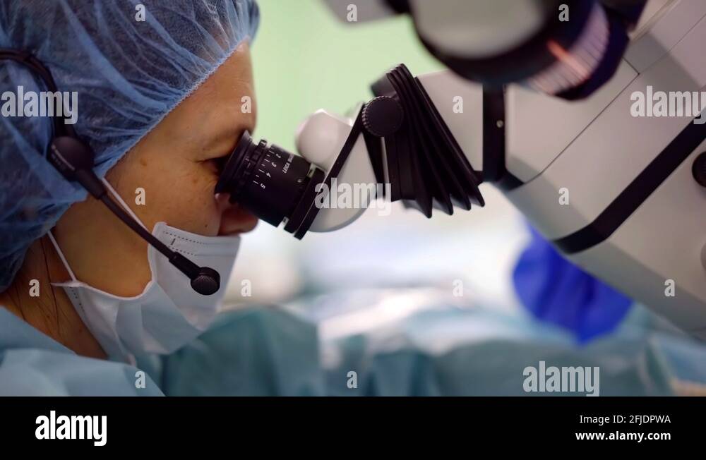 Process of an cochlear implant surgery. Surgeon working her way inside ...