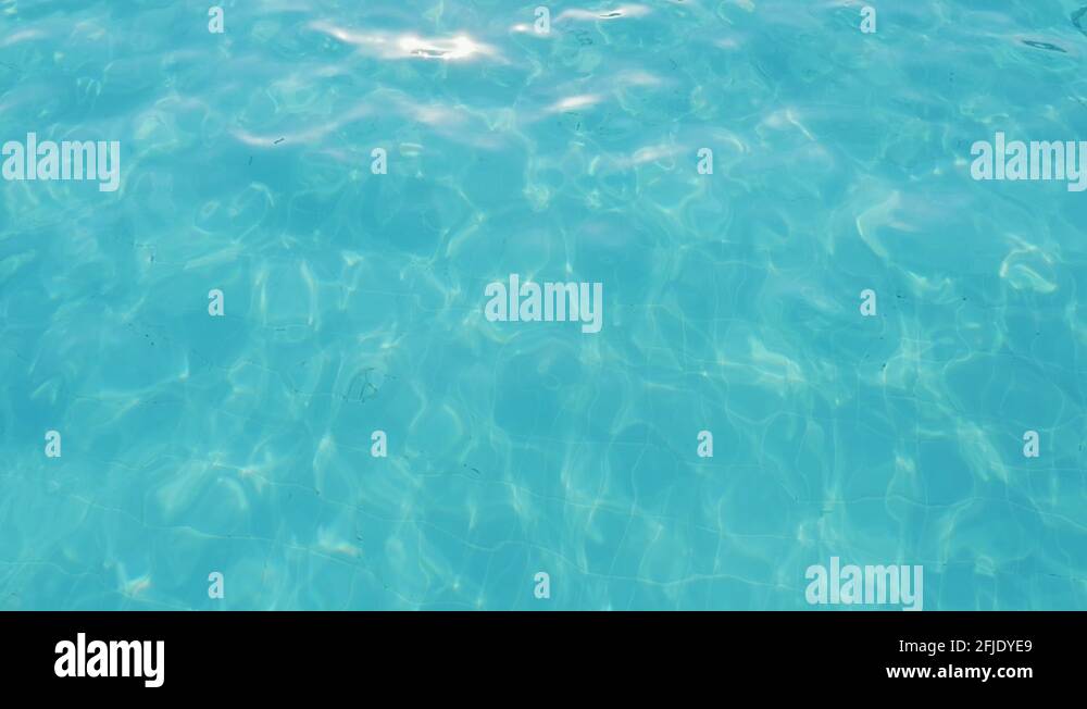 Marvelous sea surface with swinging waves and a sun path on a ...