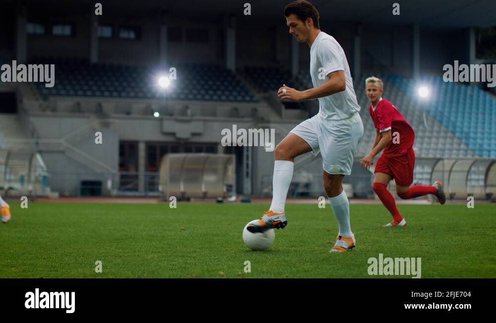 Footballer legs tackle Stock Videos & Footage - HD and 4K Video Clips ...