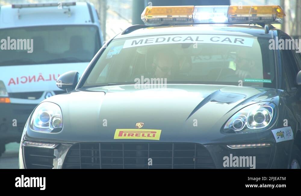 Safety medical car with paramedics, passing on the circuit of Autódromo ...